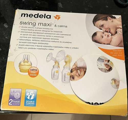 Молокоотсос medela электрический swing maxi