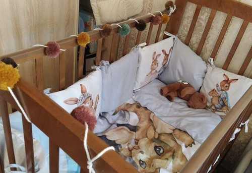 Детская кроватка с маятником гандылян
