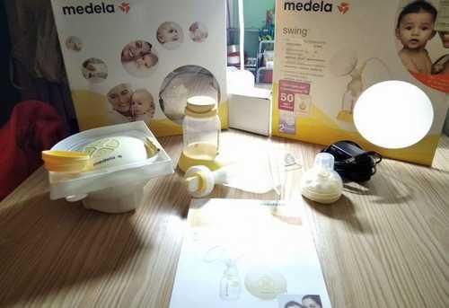 Молокоотсос medela электрический