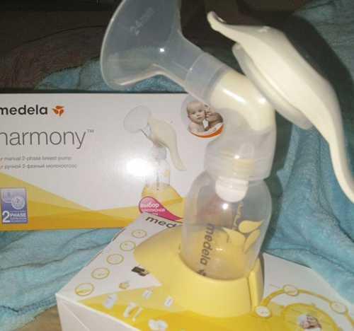 Молокоотсос medela ручной новый