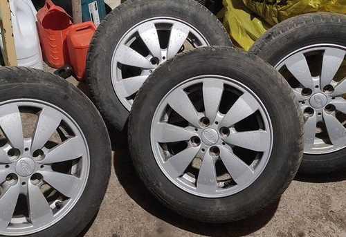 Продам комплект колес на литых дисках r14