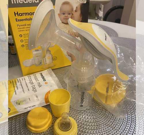 Молокоотсос medela ручной