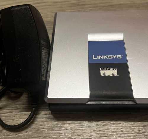 Phone adapter with router Linksys модель spa2102