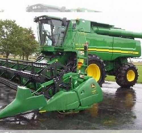 В разборе сельхозтехника John Deere