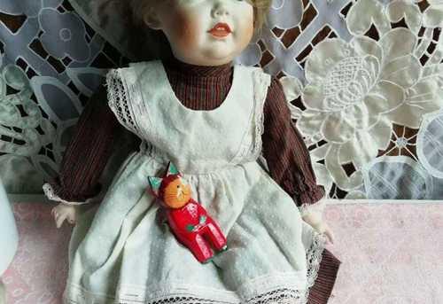 Кукла фарфоровая, похожа на Хильду (Кестнер)