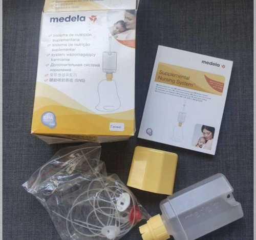 Дополнительная система кормления medela