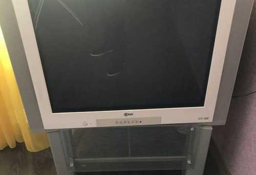 Телевизор LG со стеклянной тумбой