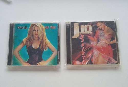 Диски CD Shakira - she wolf, J. Lopez - rebirth