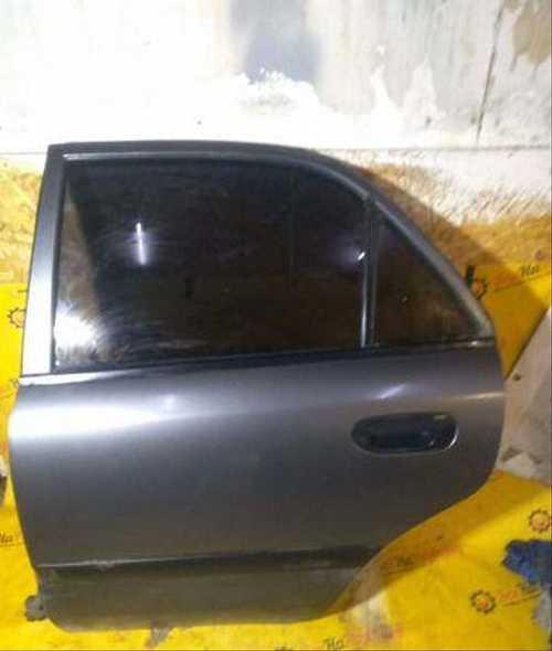 Дверь в сборе задняя левая Mitsubishi Carisma