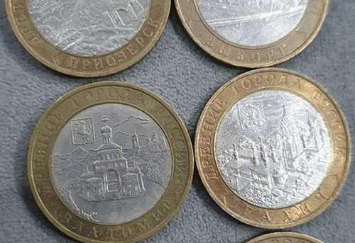 Монеты биметалл города