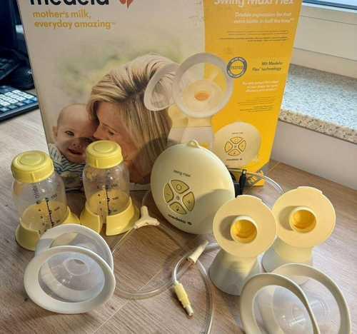 Молокоотсос medela электрический swing maxi flex