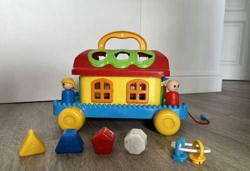 Развивающие игрушки - Сказочный домик на колесиках