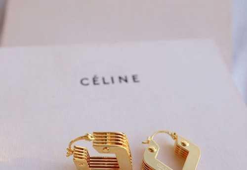 Золотые серьги Celine