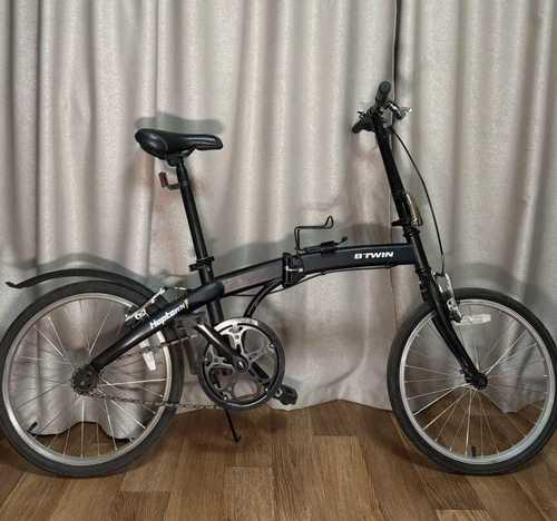 Велосипед b-twin hoptown 1 складной