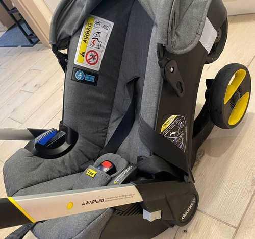 Автолюлька группа 0  до 13 кг Doona   база Isofix