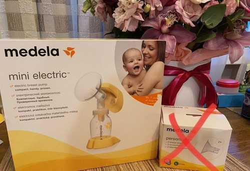 Молокоотсос medela mini electric