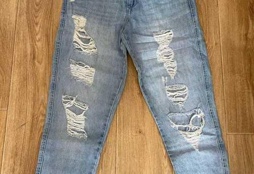 Женские джинсы Мохито рваные 40 xs