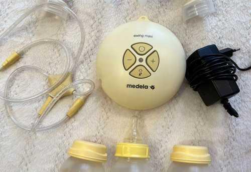 Молокоотсос электрический двойной medela