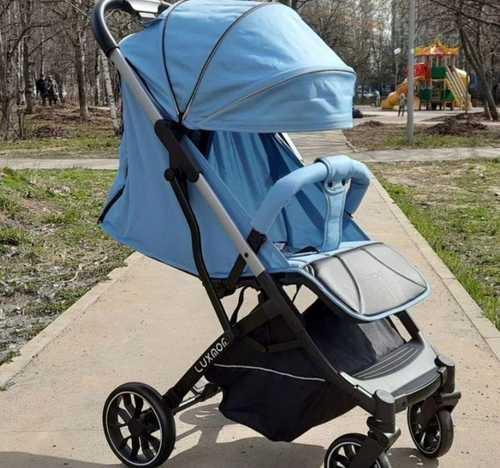 Детская прогулочная коляска Luxmom