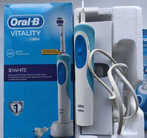 Электрическая зубная щетка oral b