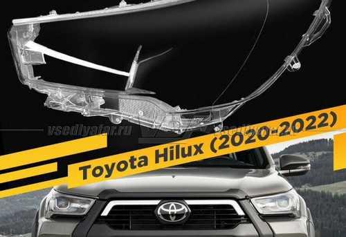 Стекло для фары Toyota Hilux (2020-2022) Левое