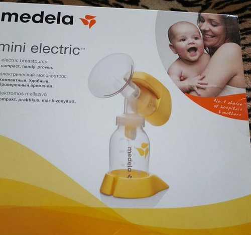 Молокоотсос medela электрический