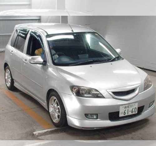 Бампер на mazda demio