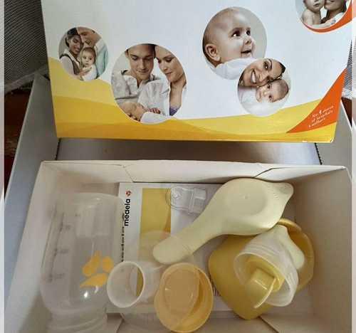 Молокоотсос medela