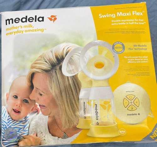 Молокоотсос medela электрический