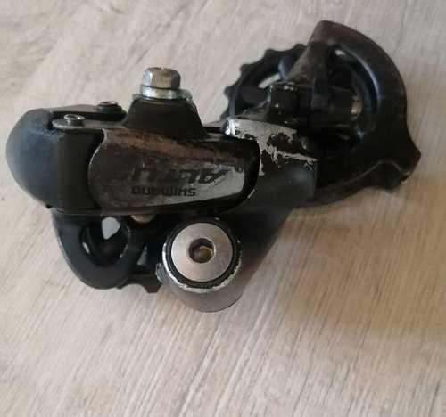 Задний переключатель shimano altus
