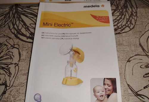 Молокоотсос medela электрический