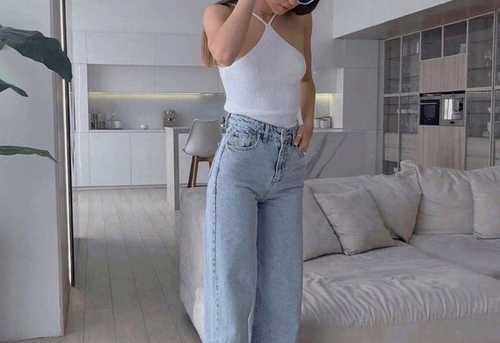 Женские джинсы "Трубы" с разрезами с низу