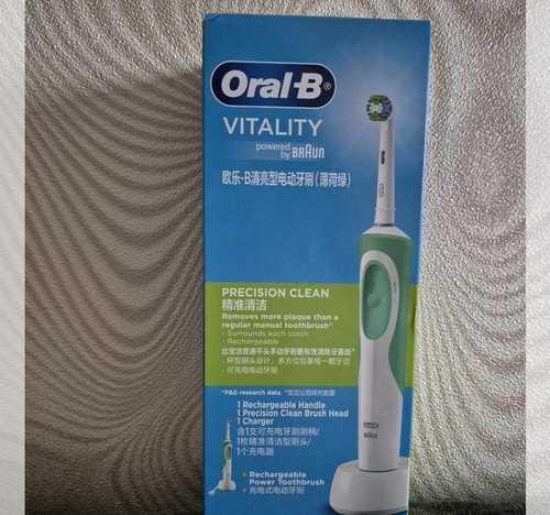 Электрическая зубная щетка oral b новая