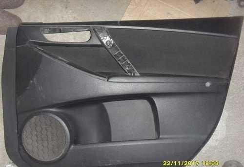 Обшивка двери передней правой Mazda 3 (BL) Мазда