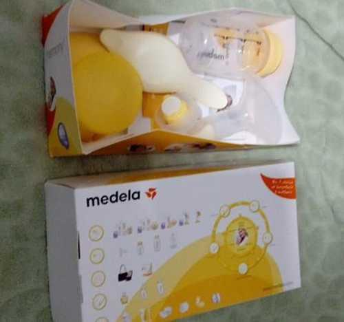 Молокоотсос medela ручной