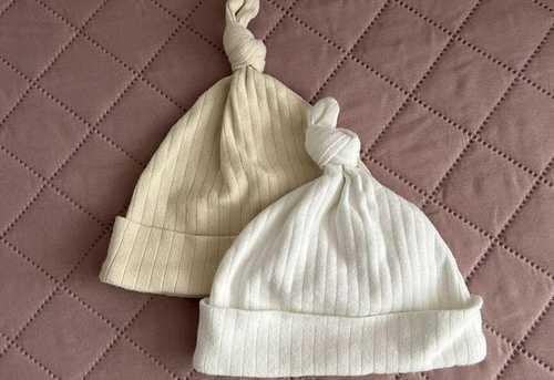 Комплект шапочек на новорожденных