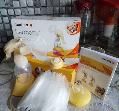 Молокоотсос medela ручной