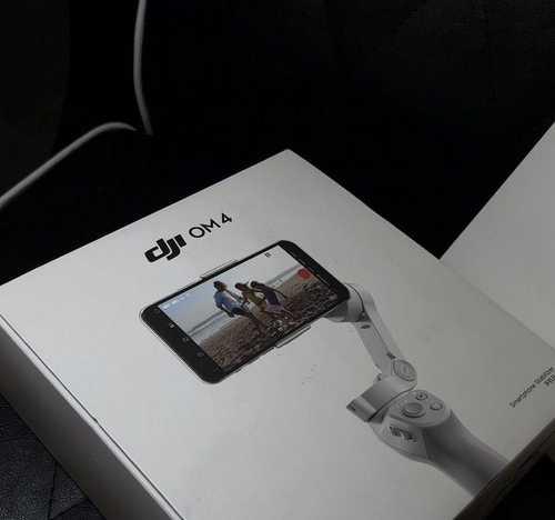 Ручной стабилизатор и стедикам DJI Osmo Mobile 4