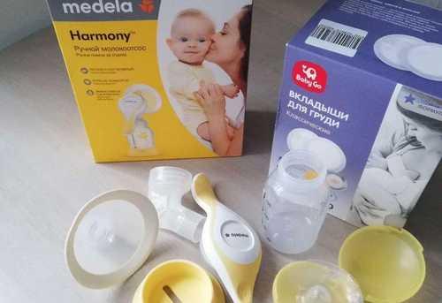 Молокоотсос medela ручной, накладки для сосков