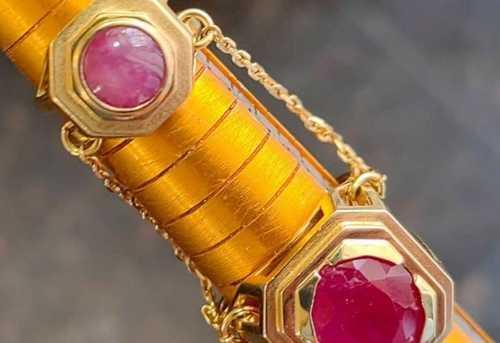 Двойное золотое кольцо с рубинами