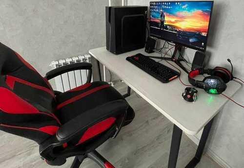 Игровой компьютер с монитором и креслом