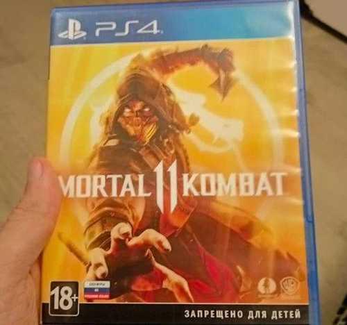 Диск с игрой Mortal kombat 11 ps4