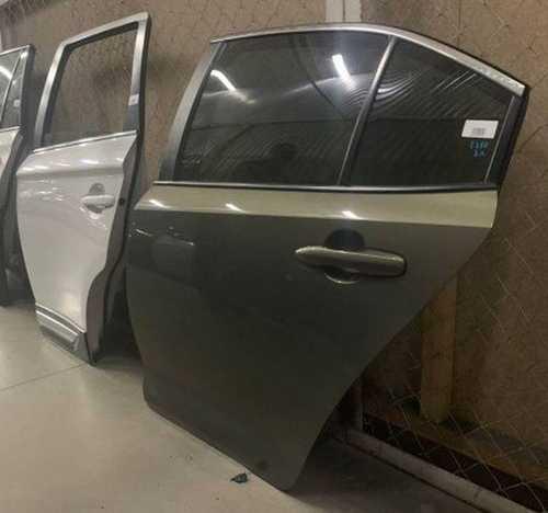 Задняя дверь левая оригинал Тойота Королла Е210