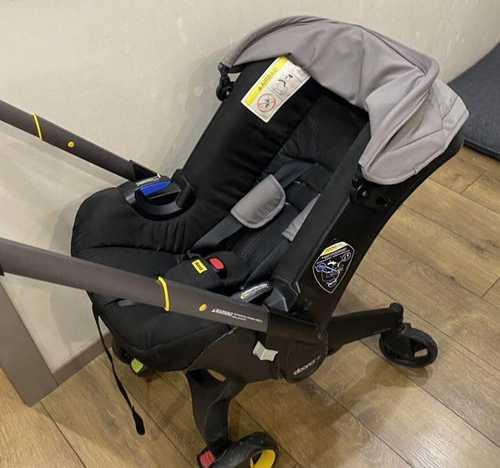 Коляска автокресло doona с базой isofix