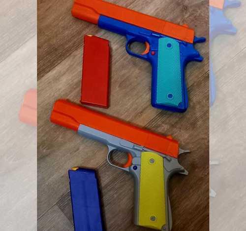 Игрушка пистолет