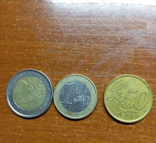 Монеты евро (2 евро, 1 евро, 50 центов)
