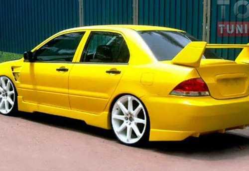 Бампер задний mitsubishi lancer 9