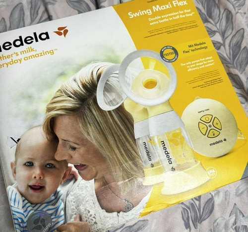 Молокоотсос medela электрический