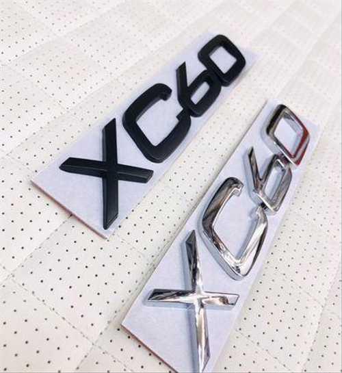 Логотип XC60 на Вольво