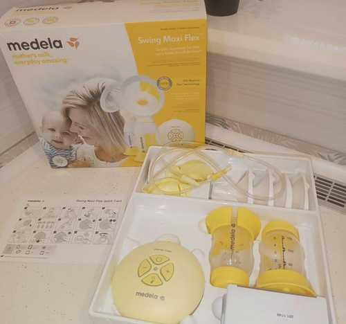 Молокоотсос medela swing maxi flex